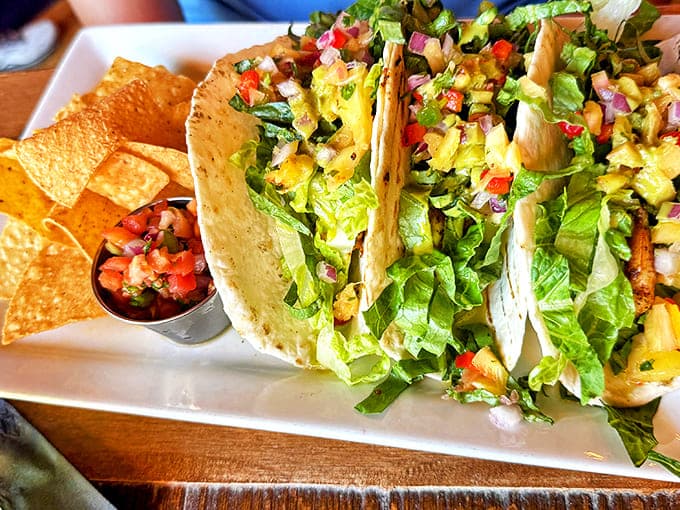 Fresh, vibrant, and unapologetically stuffed – these tacos bring a fiesta to your table with crisp lettuce and colorful toppings spilling out like confetti.