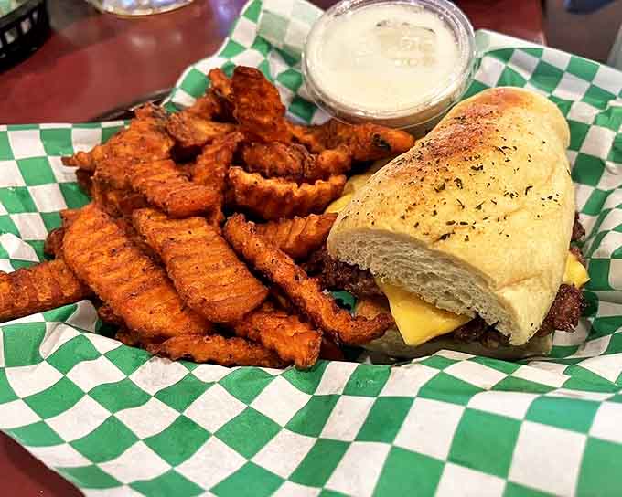 The classic burger and sweet potato fries combo &ndash; simple ingredients transformed into something magical through decades of burger-crafting expertise.