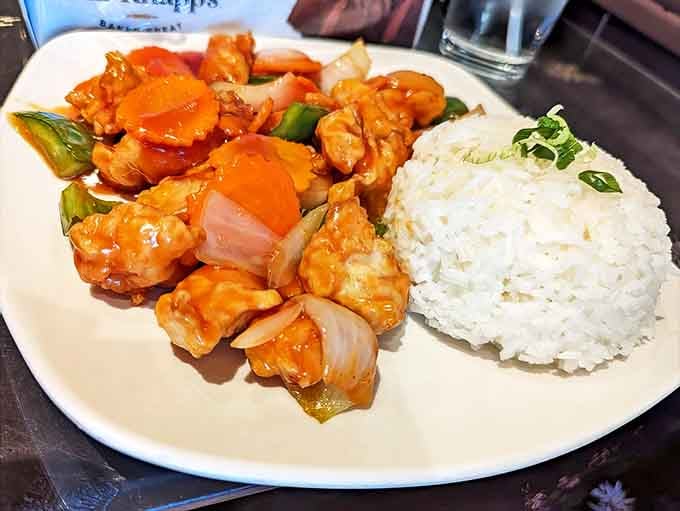 Sweet & Sour Chicken that actually balances both elements perfectly. No neon-orange sauce here &ndash; just bright flavors that dance between tangy and sweet.