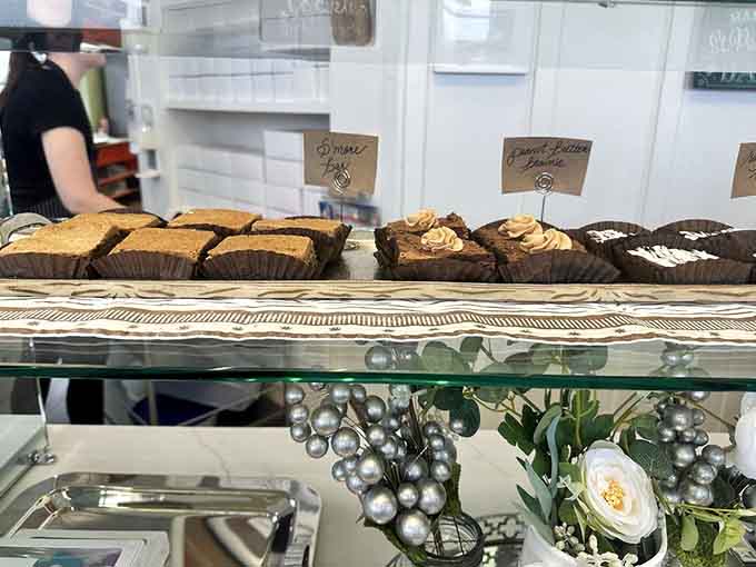 Brownies stacked like delicious chocolate bricks, each one promising that perfect fudgy texture that brownie lovers crave desperately.