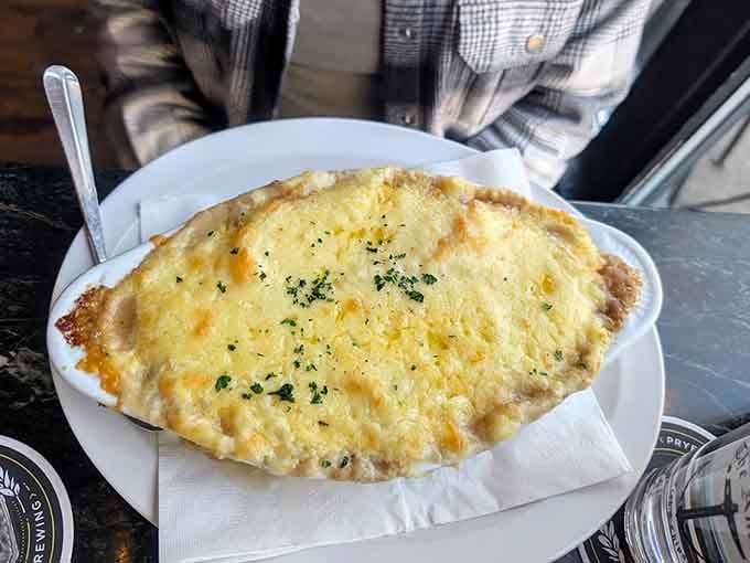 Shepherd's Pie with a cheese-crusted top that's basically edible happiness baked until golden and bubbly.