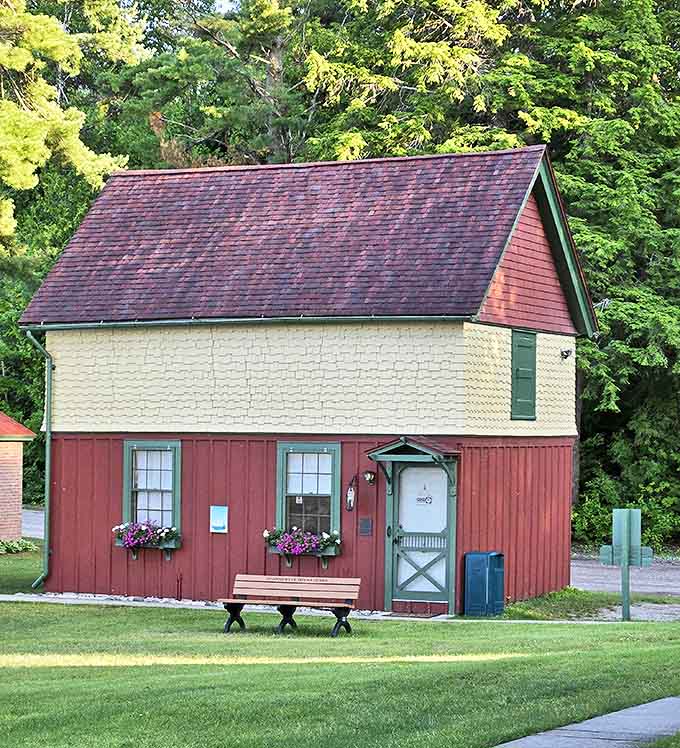 Inside the Calcite Pilot House, time stands still as the captain's wheel awaits hands that will never again guide this vessel through stormy Great Lakes passages.
