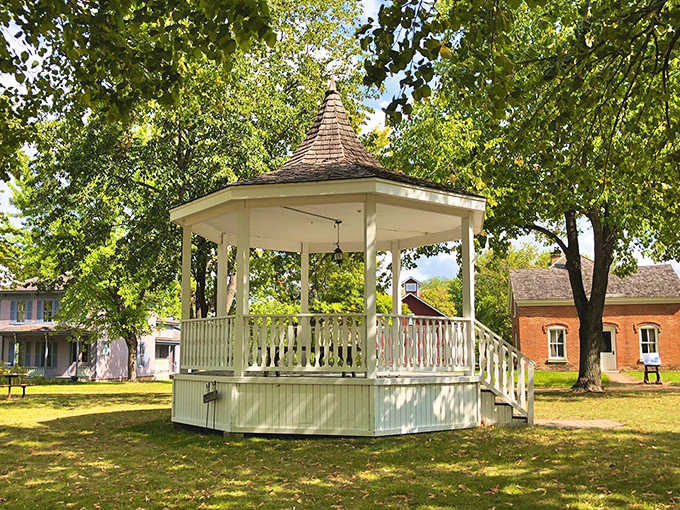 The village gazebo stands ready for summer concerts and Sunday socials, a gathering place where community bonds were forged.