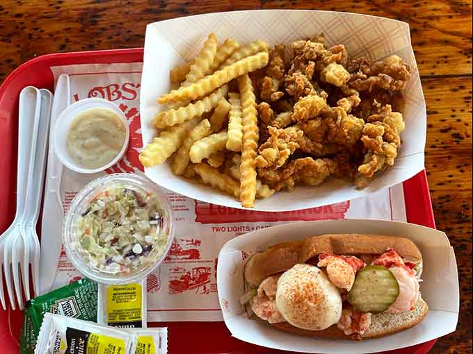 This generous clam boat overflowing with golden fried seafood and fries proves The Lobster Shack doesn't skimp on portions or quality.
