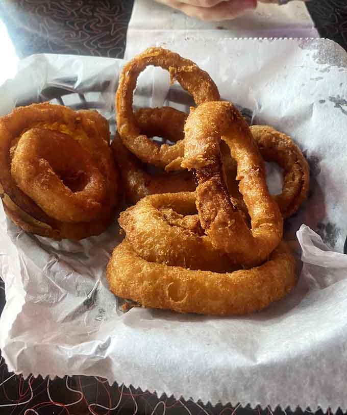 These onion rings achieved the impossible: a perfectly crispy coating that lets the sweet onion shine through like a champion.