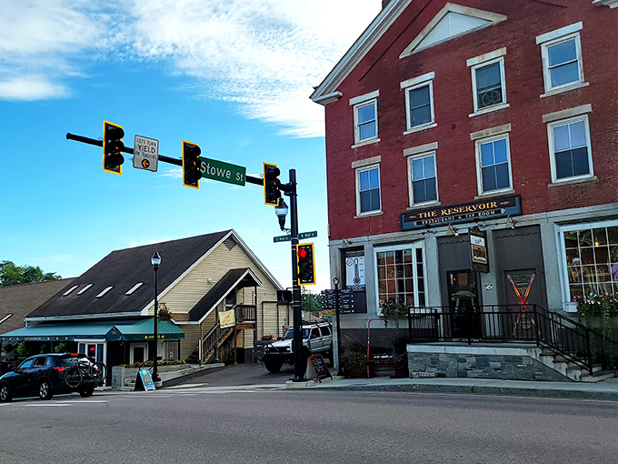 The Reservoir Restaurant anchors a prominent corner, its brick fa&ccedil;ade and welcoming entrance promising locally-sourced delights inside.