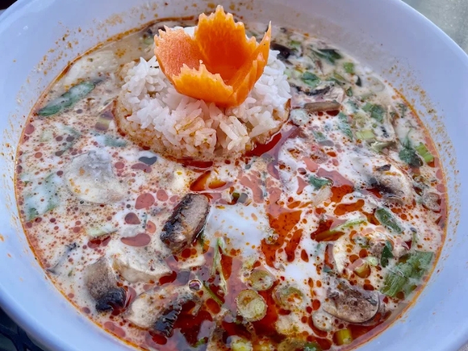 Clear broth, vibrant with lime and chili, dotted with mushrooms that have soaked up every bit of that aromatic goodness.