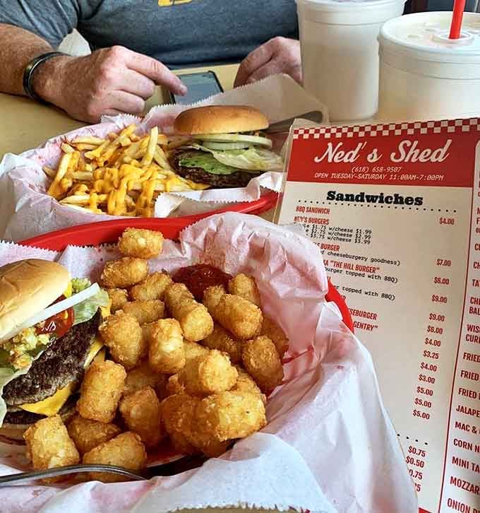 Triple cheeseburgers with both tater tots and cheese fries &ndash; because sometimes you need to make bold life choices.