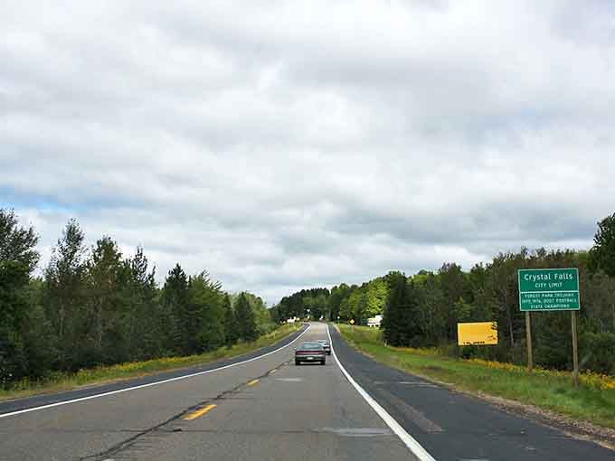 Welcome to Crystal Falls, where the town sign promises small-town charm and the surrounding forests deliver big-time natural beauty.