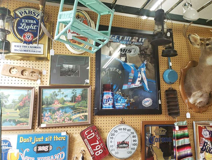 Beer signs, vintage advertisements, and nostalgic memorabilia transport visitors to an era when every garage had character and stories.