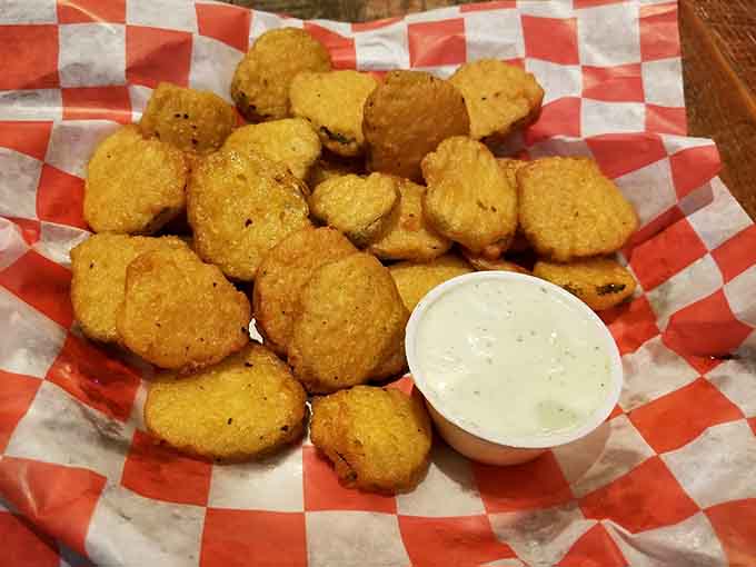 Golden fried pickle chips deliver that perfect tangy crunch that keeps you reaching for more.