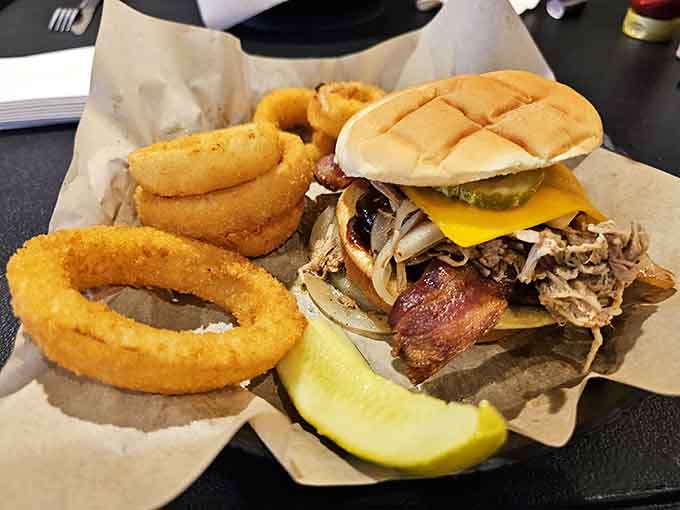 This pulled pork sandwich with onion rings proves that lunch at Wooden Nickel is just as worthy of your attention as breakfast.
