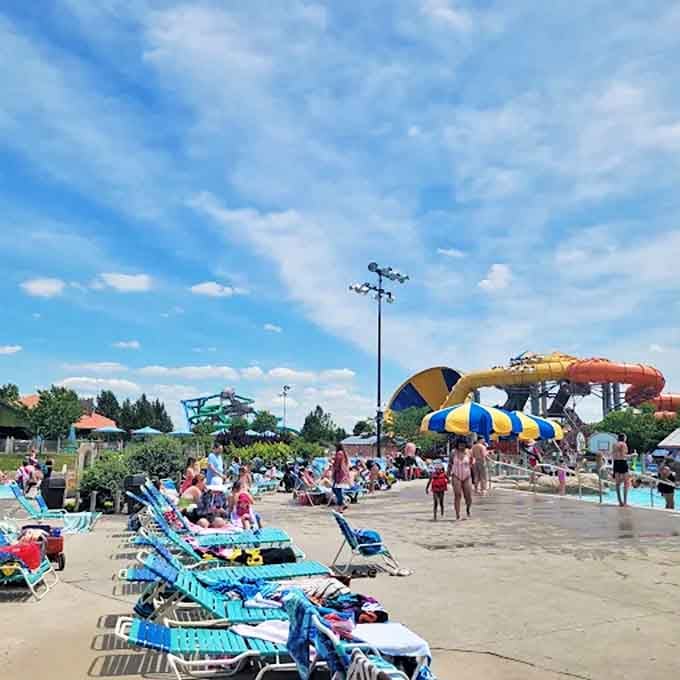 Blue loungers await sun-seekers who've mastered the art of relaxation between water adventures and snack bar expeditions.