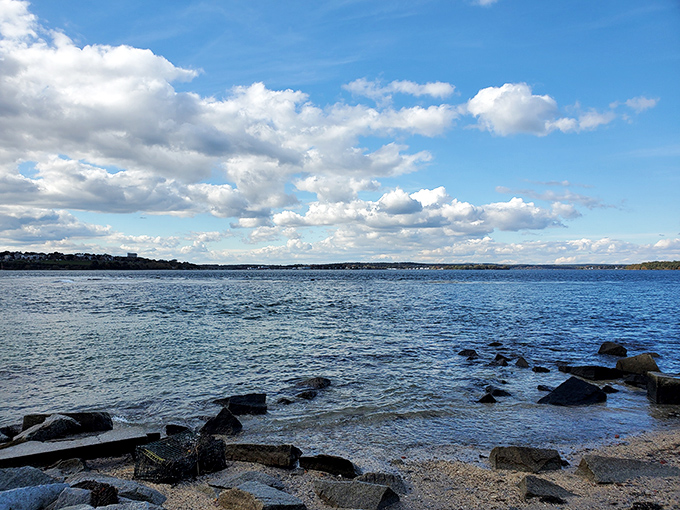 Rocky Maine coastline meets the Atlantic, with the same rugged beauty that has greeted sailors and defenders for centuries.