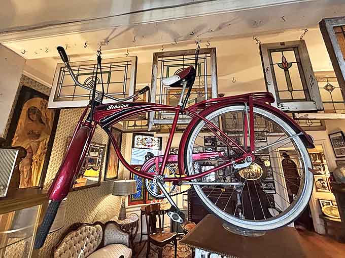 That classic Schwinn bicycle suspended overhead proves that even transportation can be art when it's built right.