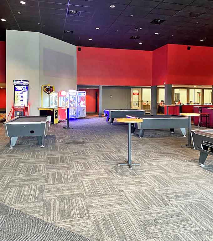 Pool tables await strategic minds and lucky shots alike, their felt surfaces pristine and ready for both sharks and those who still don't understand what "English" means in billiards.