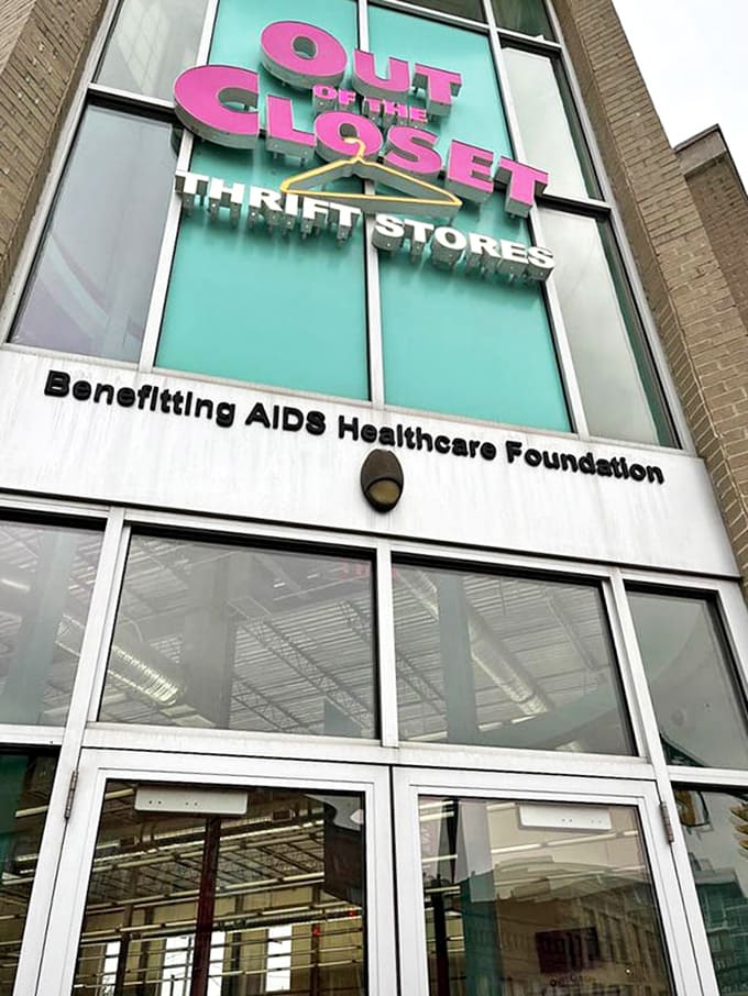 The bold pink and turquoise signage announces the store's mission: fabulous finds that fund a worthy cause.
