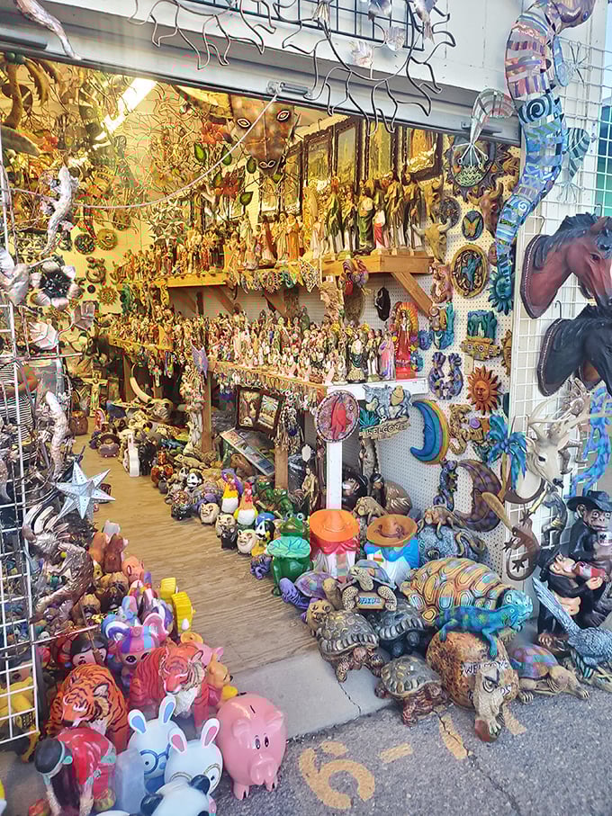 Southwestern wonderland! This vendor's stall overflows with colorful Mexican folk art, religious icons, and desert-themed decorations for every taste.