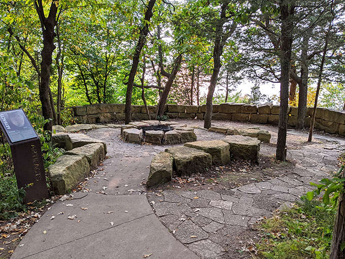 Stone fire pit area where s'mores taste 73% better and ghost stories become 89% more believable as darkness falls.