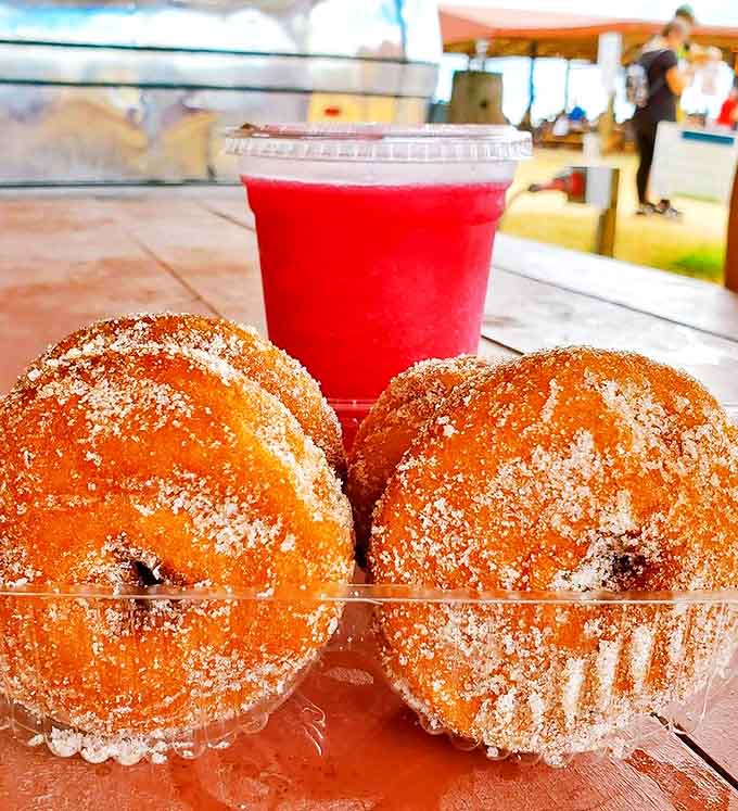Fresh from the fryer, these donuts achieve the impossible balance of crispy exterior and tender, cake-like interior that haunts dreams.