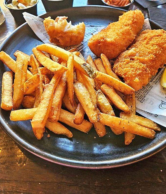 Golden, crispy, and seasoned just right – these fries aren't merely a side dish but a supporting actor deserving of their own standing ovation.