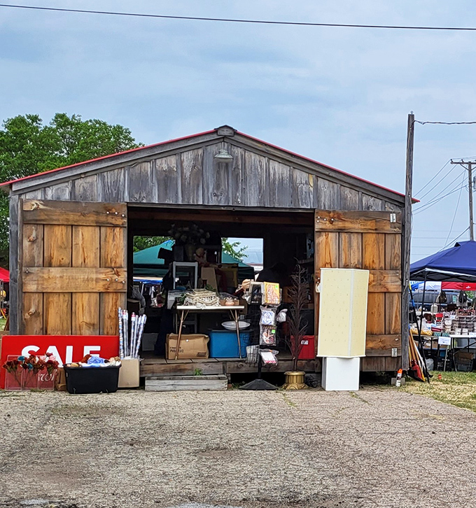 This weathered barn-style structure houses additional vendors during special events, adding rustic charm to the treasure hunting experience.