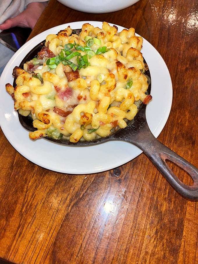 Mac and cheese achieves its final form in this cast-iron skillet masterpiece. Those crispy edges where cheese meets hot iron? Worth fighting over.
