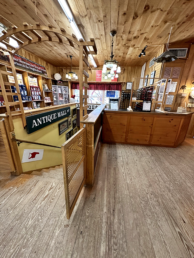 The mall's rustic wooden interior and welcoming counter invite treasure hunters to begin their antiquing adventure.