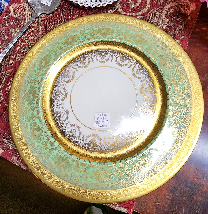 Mint-green and gold elegance captured in porcelain &ndash; this vintage dinner plate represents the fine dining experiences of a more formal era.