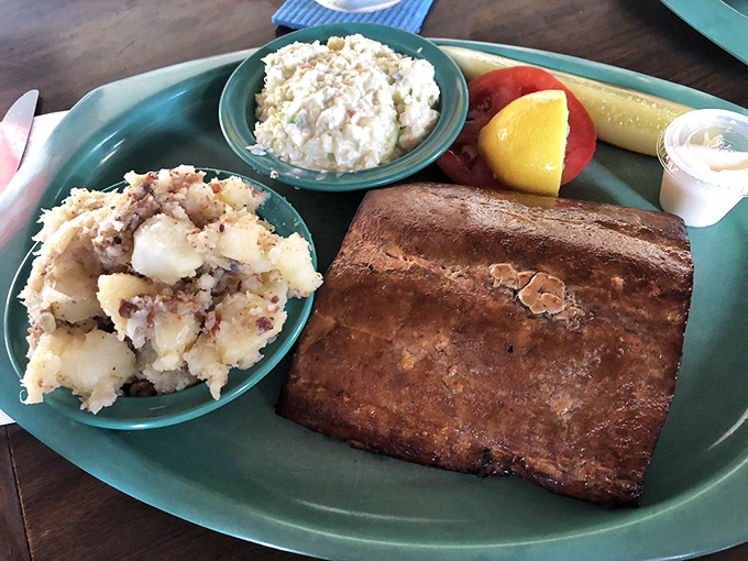 Every plate tells a story of tradition &ndash; the smoky fish, tangy German potato salad, and crisp coleslaw create a perfect Florida trifecta.