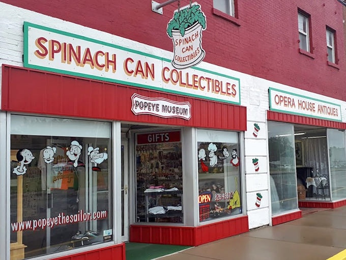 Spinach Can Collectibles celebrates Popeye with cheerful red and white paint and character decorations.