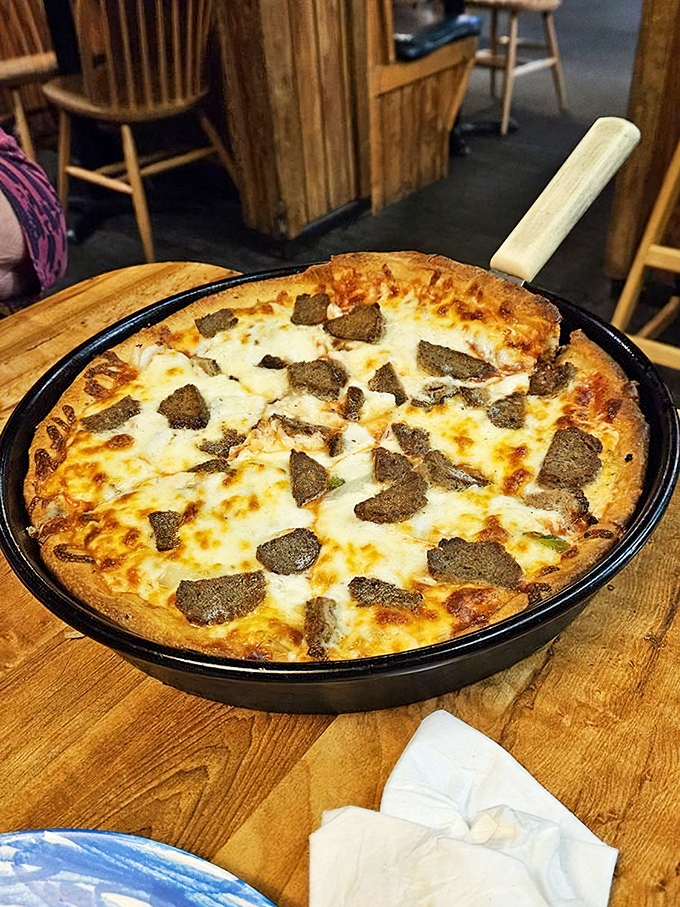 Three toppings? More like three reasons to cancel your plans and surrender to the inevitable food coma that follows this magnificent creation.