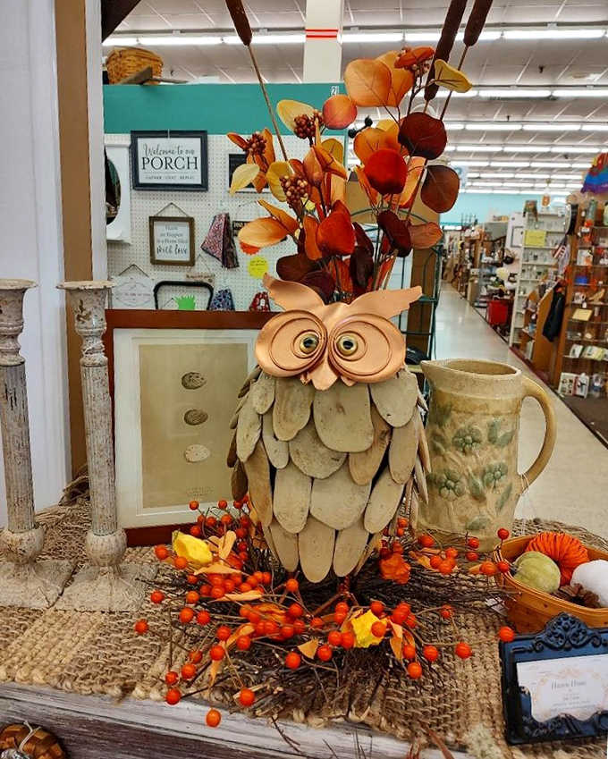 This whimsical wooden owl, surrounded by autumn foliage, brings charm and character that mass-produced decor simply can't match.