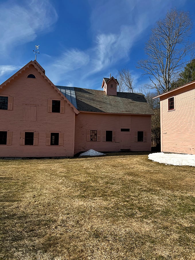The barn echoes the main house's Gothic Revival style, creating an architectural ensemble rarely preserved so completely.