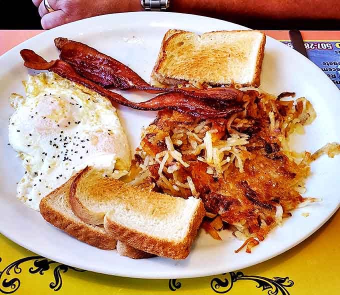 Breakfast Platter: The holy trinity of breakfast &ndash; eggs, hash browns, and toast &ndash; executed with the precision of breakfast artisans.