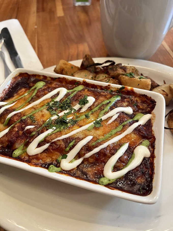 This hearty breakfast casserole arrives sizzling hot, striped with creamy sauce&mdash;comfort food that sticks to your ribs and your memory long after the plate is clean.