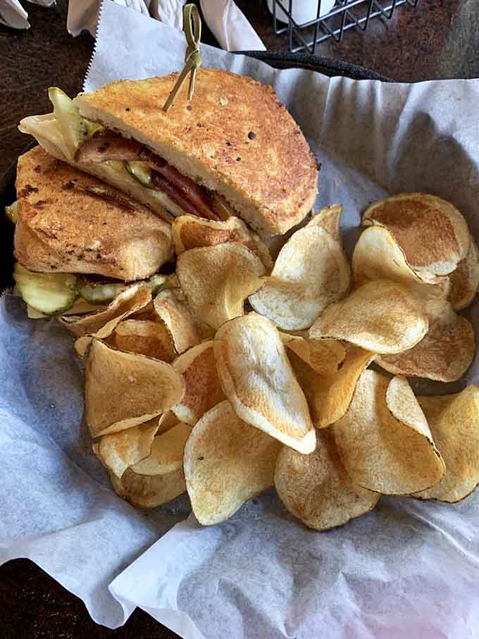 This pressed Cuban sandwich with kettle chips shows how traditional flavors shine when executed with care and quality.