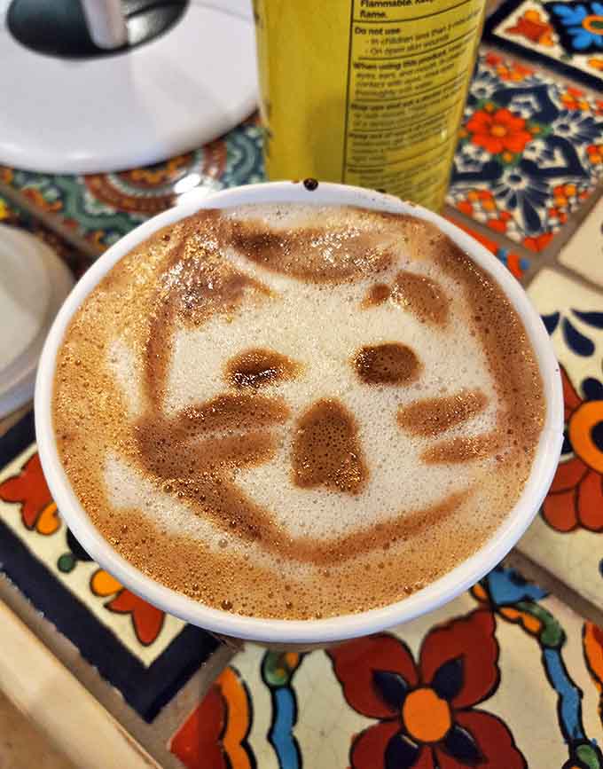 Coffee art takes a feline turn with this cappuccino sporting a cat face design &ndash; almost too adorable to drink. Almost.