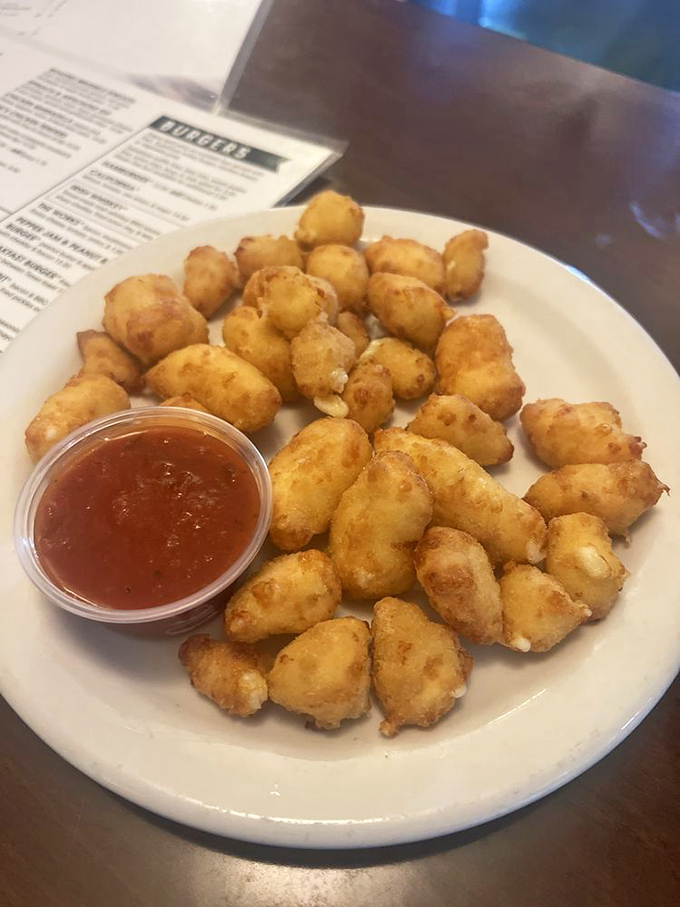 Cheese curds that squeak between your teeth &ndash; nature's way of saying "these are the good ones." Dipping sauce not optional.