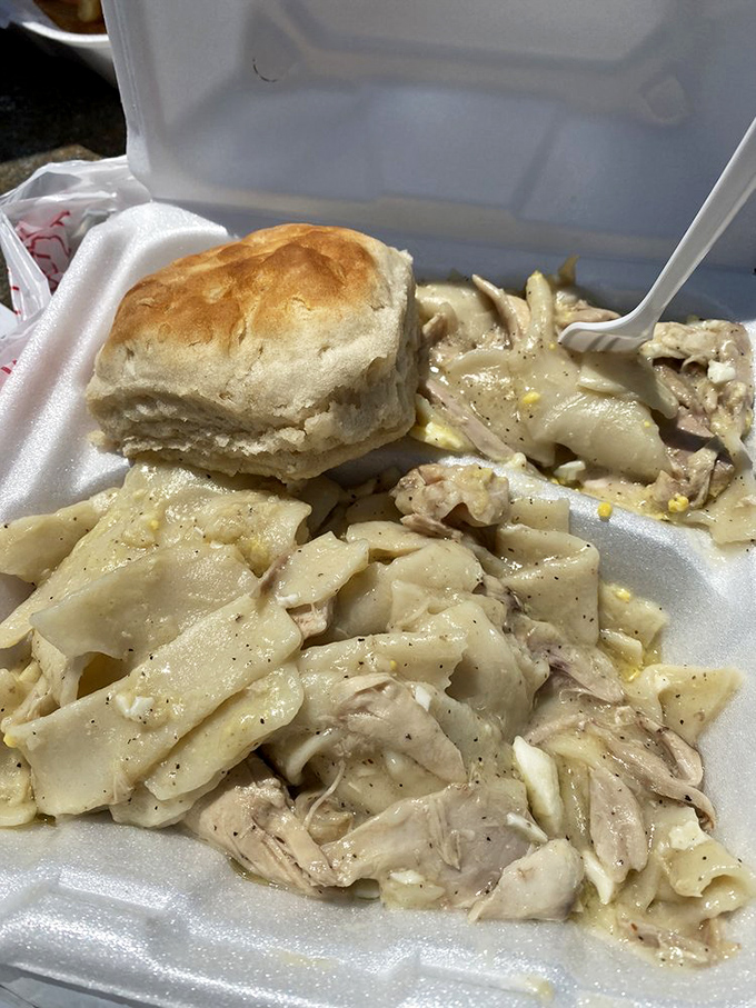 Comfort in a container &ndash; tender chicken and pillowy dumplings swimming in savory broth with a side of homemade biscuit.