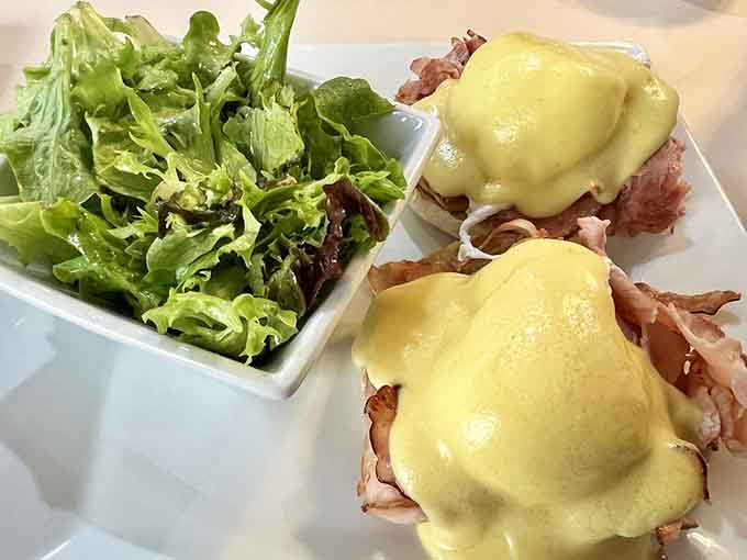 Classic Eggs Benedict showcases technical precision with perfectly poached eggs and silky hollandaise that would make brunch lovers weep.