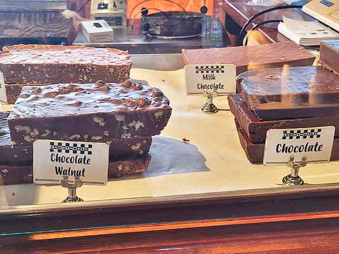 The chocolate display case &ndash; where diets go to die and happiness is measured in cocoa percentages and caramel fillings.