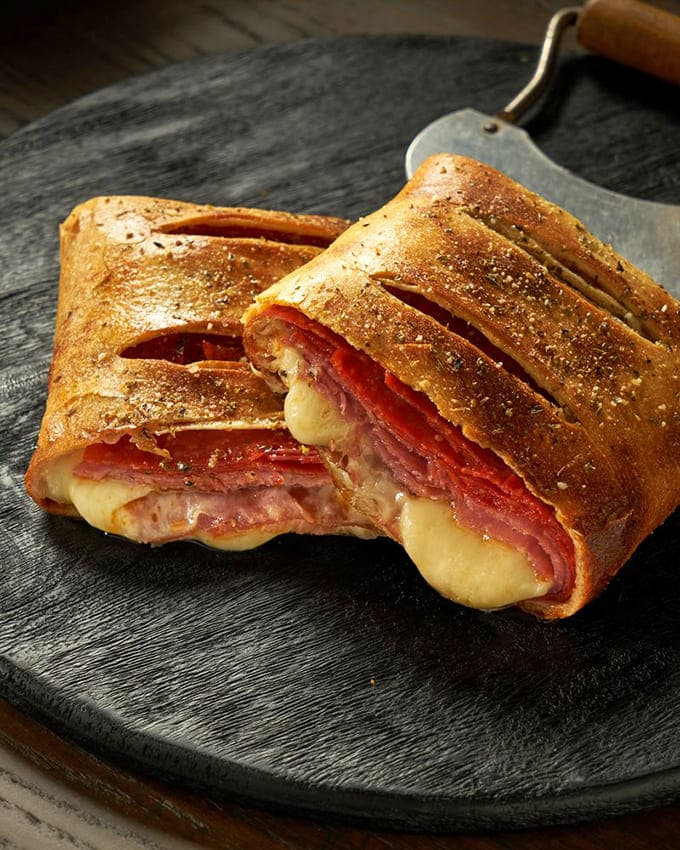The stromboli is architectural perfection &ndash; golden-brown exterior housing a perfect spiral of Italian meats and melted cheese.