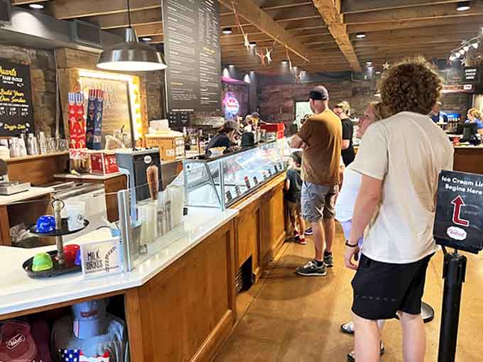 The bustling counter where ice cream dreams come true &ndash; patient servers guide indecisive customers through a rainbow of frozen possibilities.