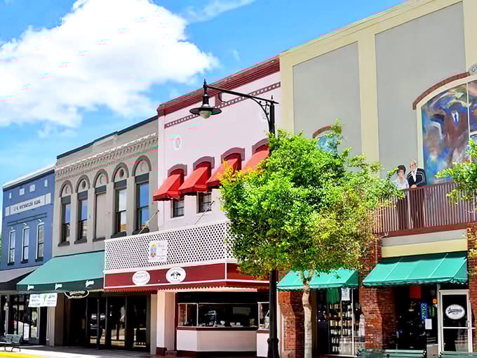 Colorful awnings and historic facades create a postcard-perfect streetscape that's as vibrant today as it was a century ago.