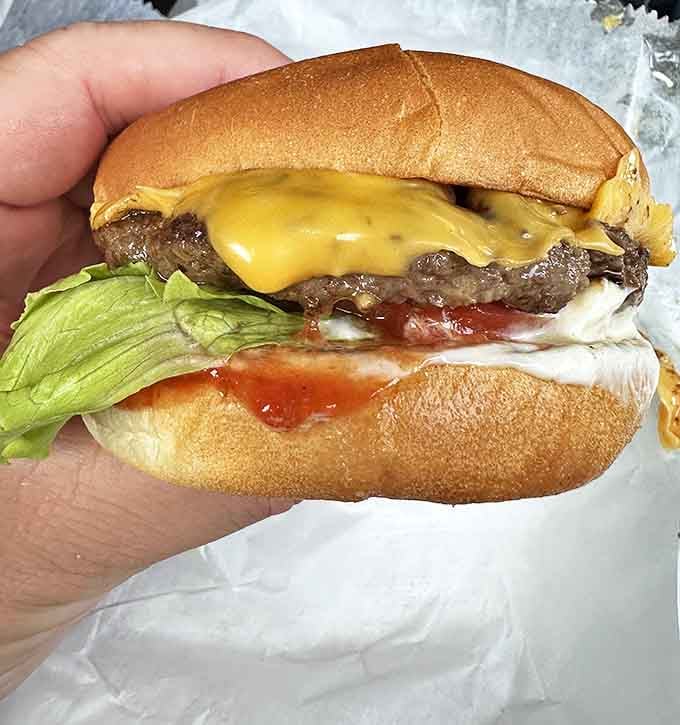 Behold the burger that launched a thousand return trips &ndash; juicy, perfectly proportioned, and somehow tasting exactly like summer vacation feels.