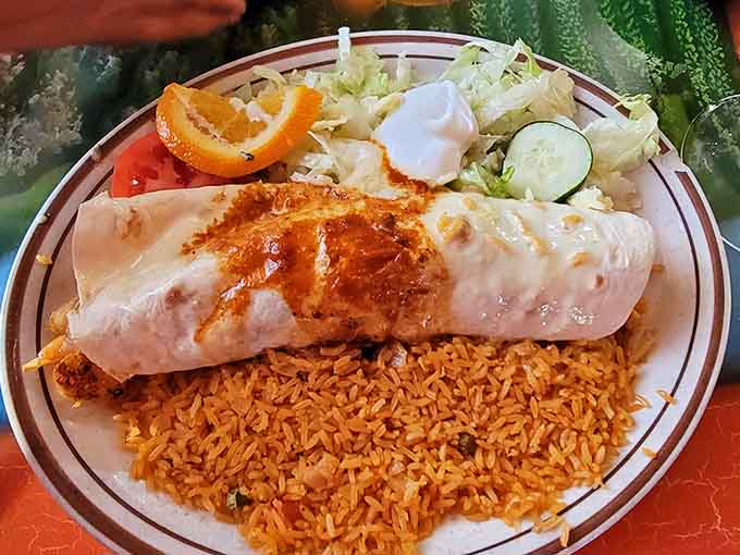 The Cancun Burrito is basically a delicious food hug wrapped in a tortilla, served with all the fixings your heart desires.