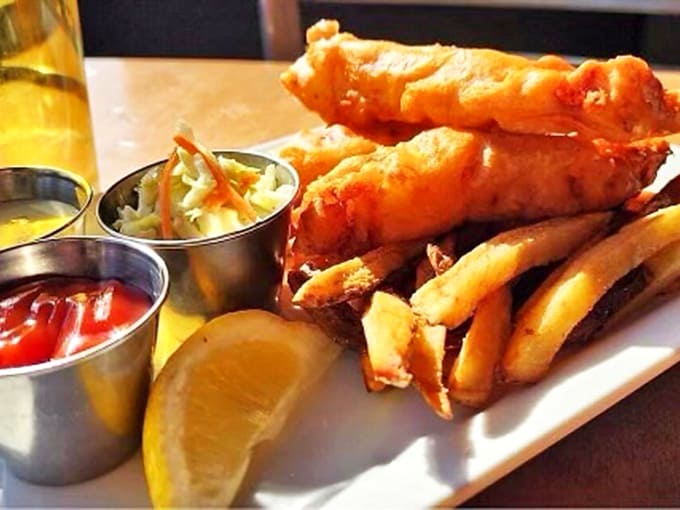 Golden-battered fish that shatters at first bite, paired with perfectly crisp fries – the kind of comfort food that makes rainy days worthwhile.