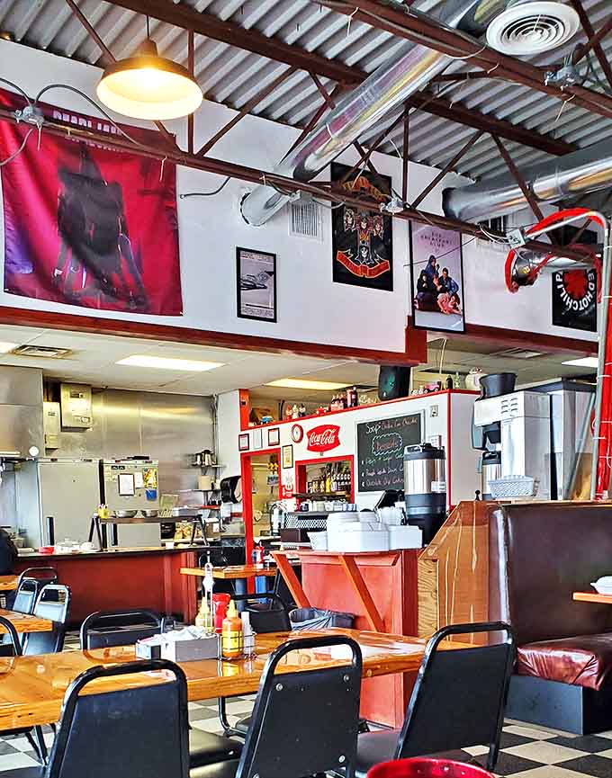 Vinyl records watching over diners like musical guardian angels. The industrial ceiling somehow makes comfort food taste even better.