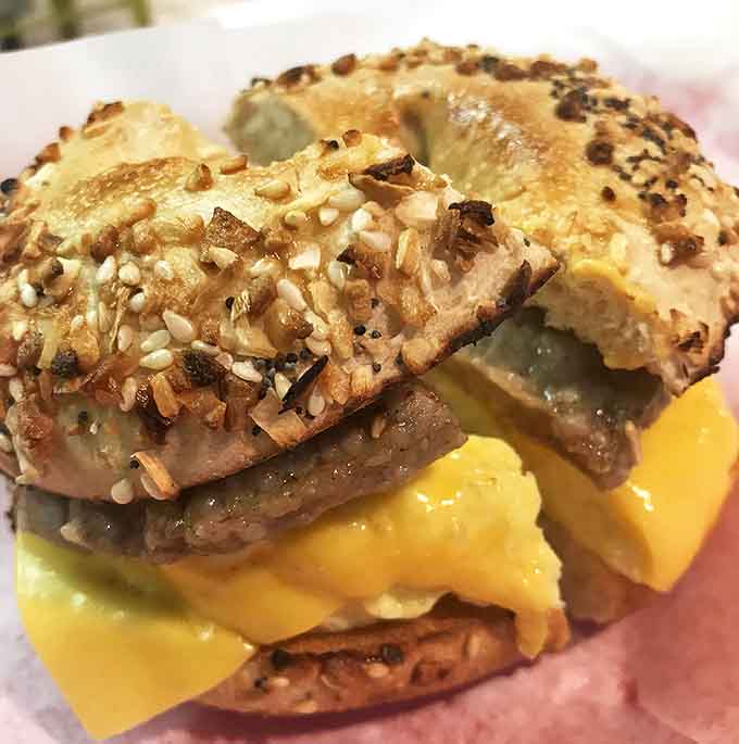 This everything bagel sandwich is wearing its seeds like jewelry. The generous egg-to-bagel ratio shows Fray's understands proper breakfast architecture.